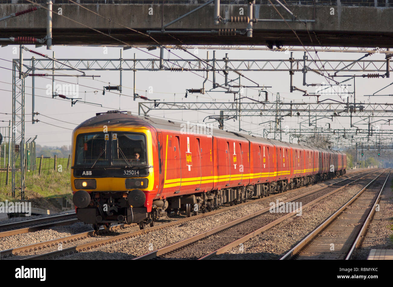 Three class 325 mail units numbers 325014, 325001 and 325013 forming a ...