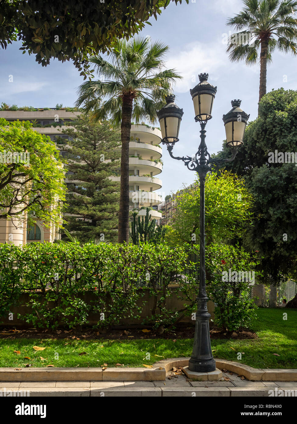 MONTE CARLO, MONACO: MAY 26, 2018: Ornate Lamp Post in garden park ...