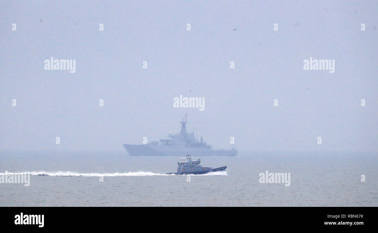 A Border Force patrol vessel (bottom) and HMS Mersey on patrol in The ...