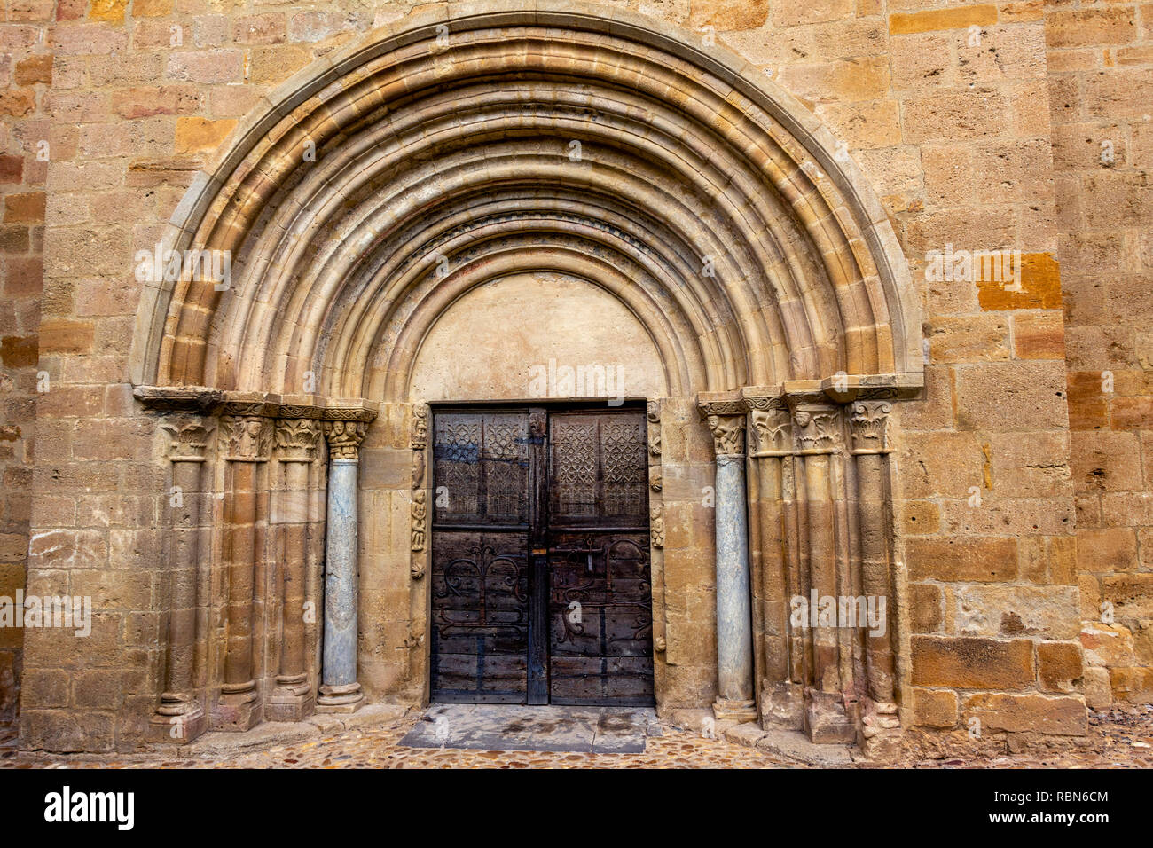 Carved porch entrance of Romanesque church in Mailhat, Puy de Dome ...