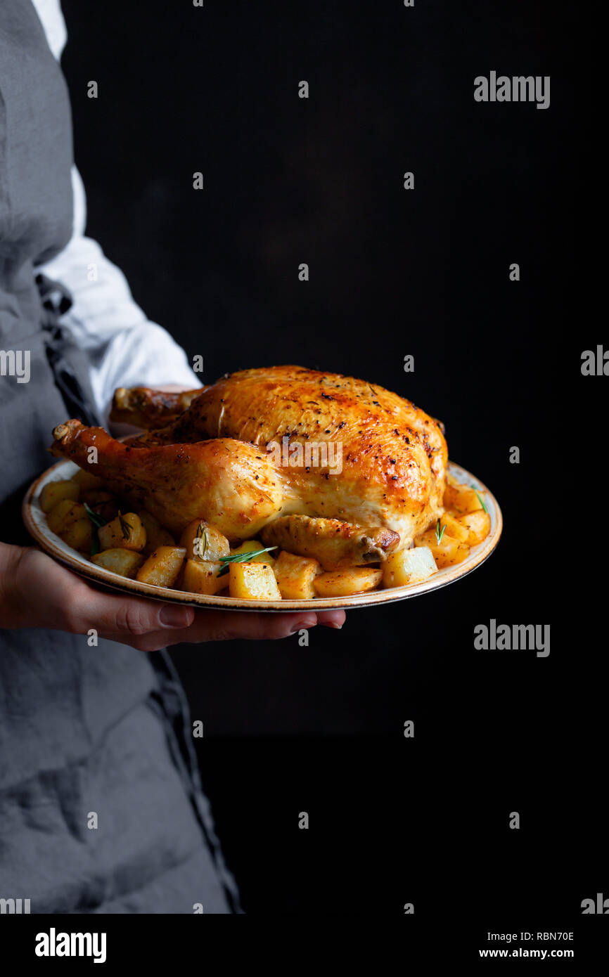 Woman chicken roast hi-res stock photography and images - Alamy