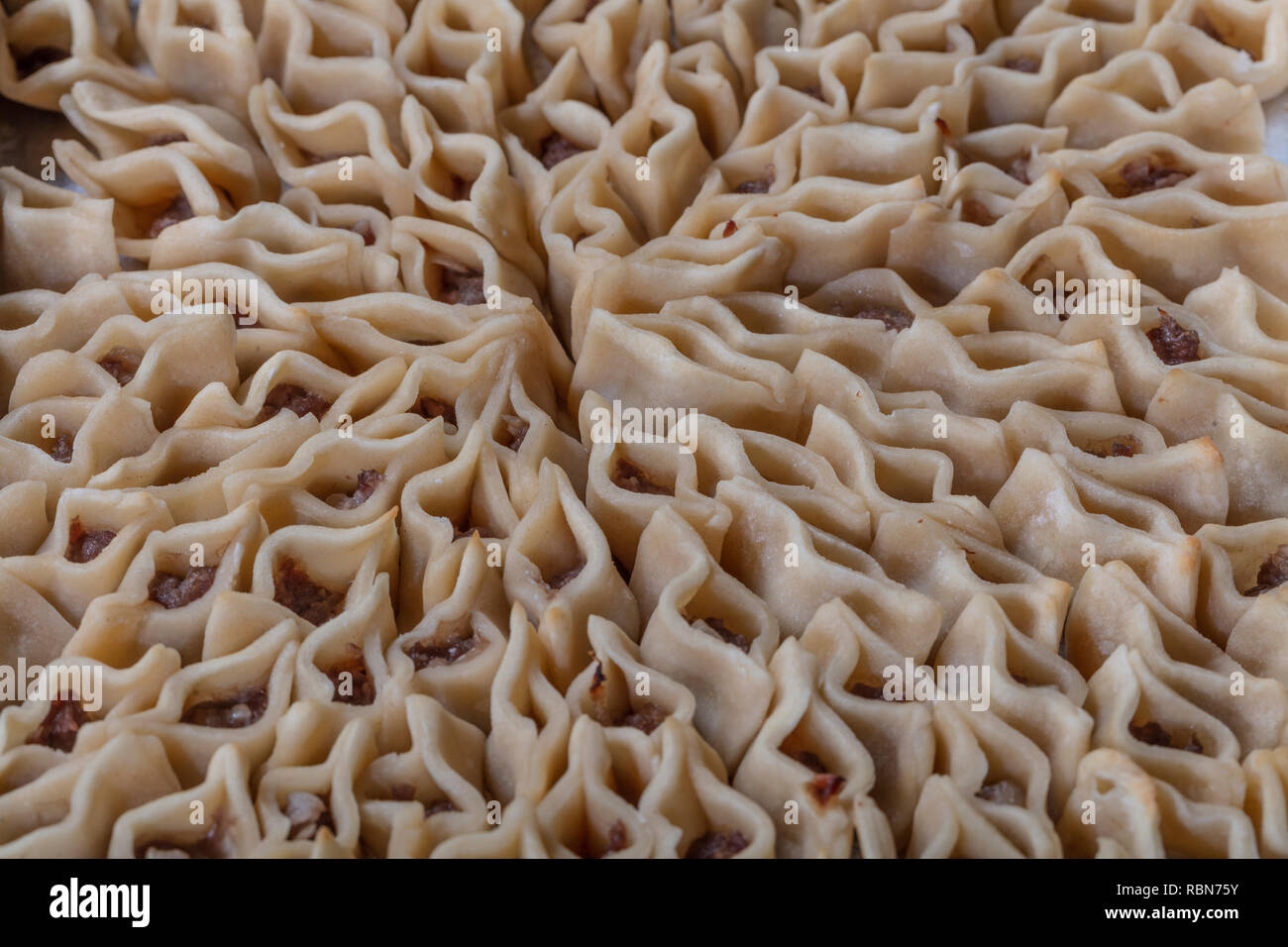 Delicious Turkish Ravioli Tepsi Manti. Turkish traditional Kayseri ...