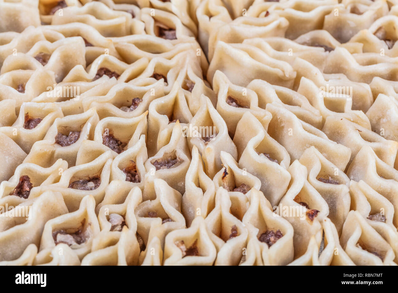 Delicious Turkish Ravioli Tepsi Manti. Turkish traditional Kayseri ...