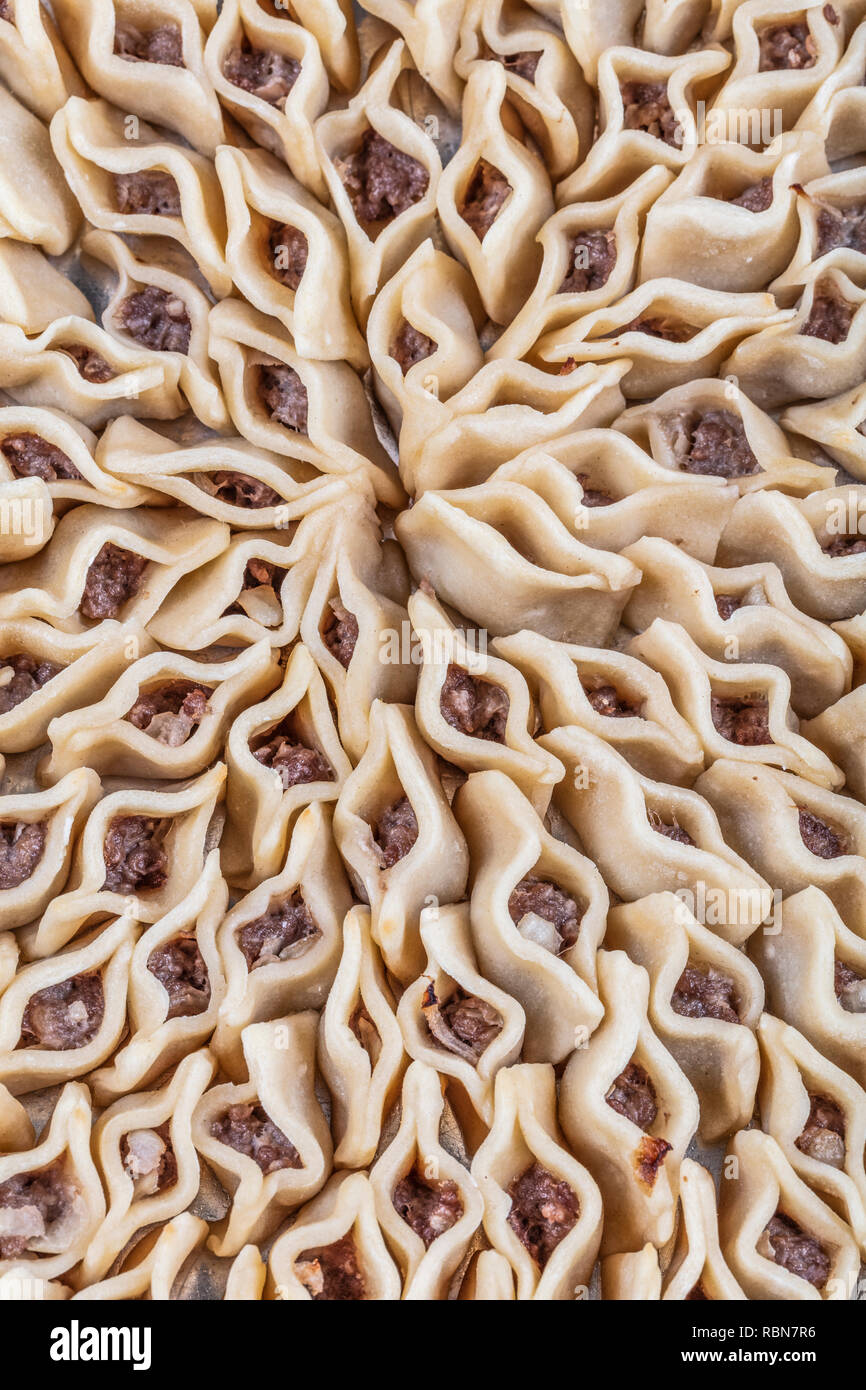 Delicious Turkish Ravioli Tepsi Manti. Turkish traditional Kayseri ...