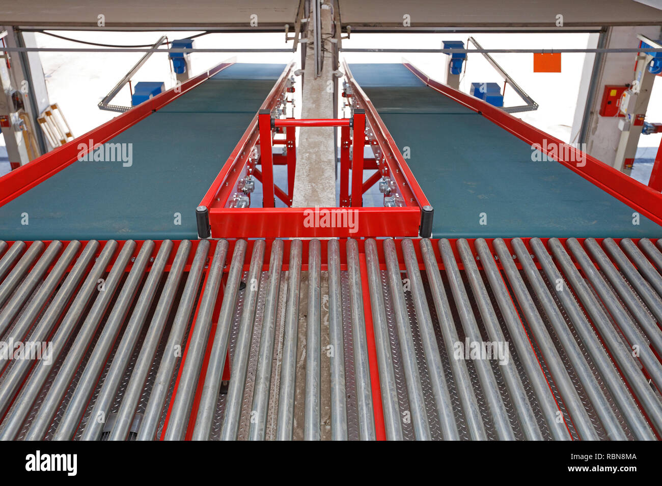 Two Conveyor Belts at Ramp for Cargo Shipping in Distribution Warehouse ...