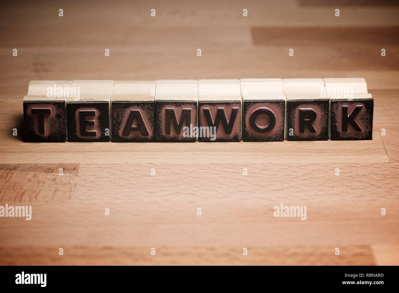 Rubber stamps creating the word teamwork Stock Photo - Alamy