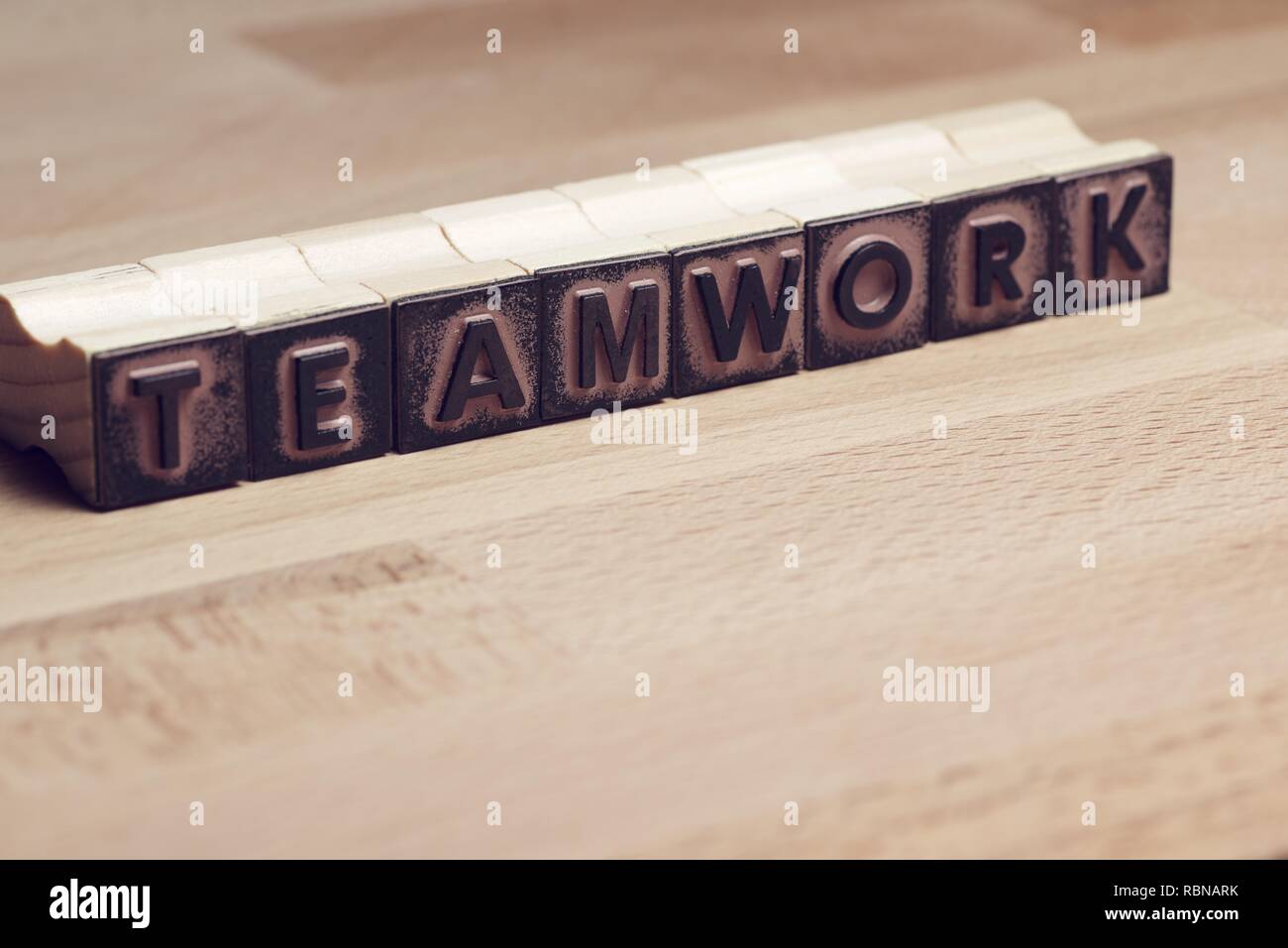 Rubber stamps creating the word teamwork Stock Photo - Alamy
