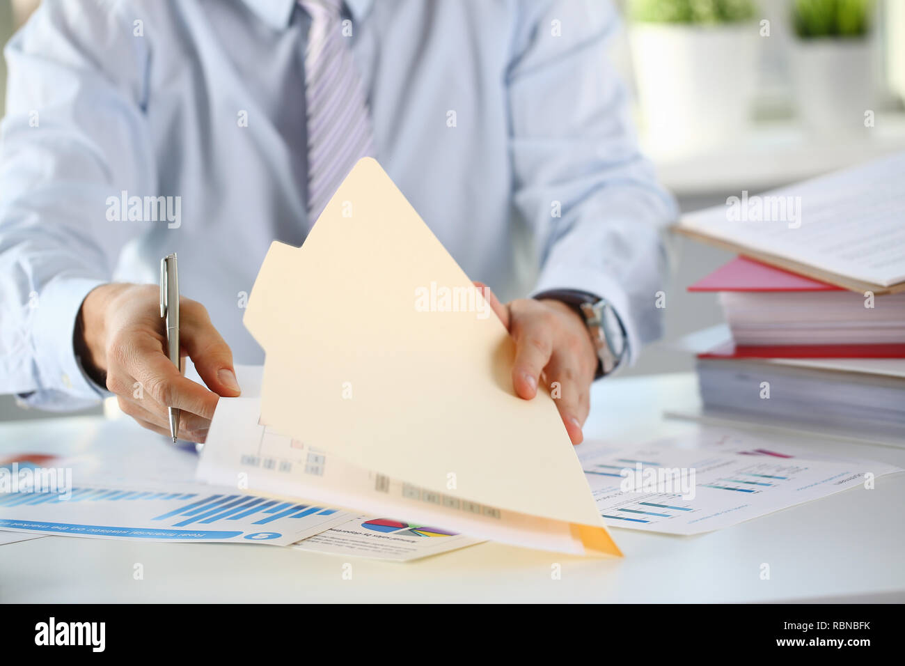 Hold documents hi-res stock photography and images - Alamy