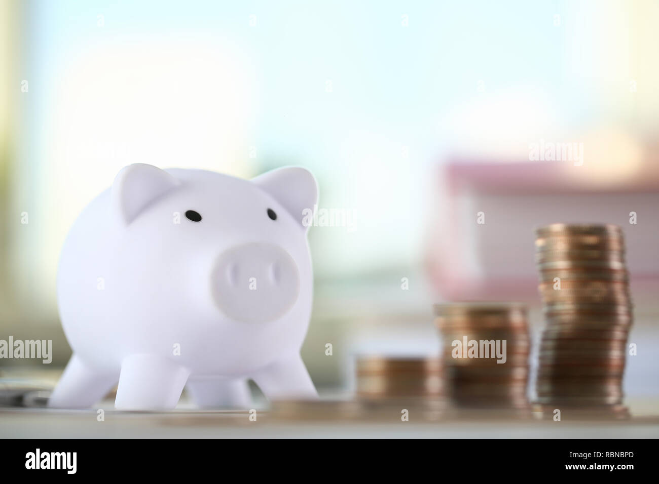Hand businessman putting pin money Stock Photo - Alamy