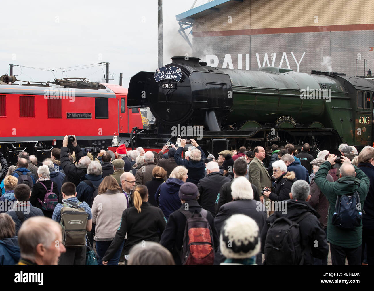 The Flying Scotsman (right) lines up next to a LNER Class 90 locomotive ...