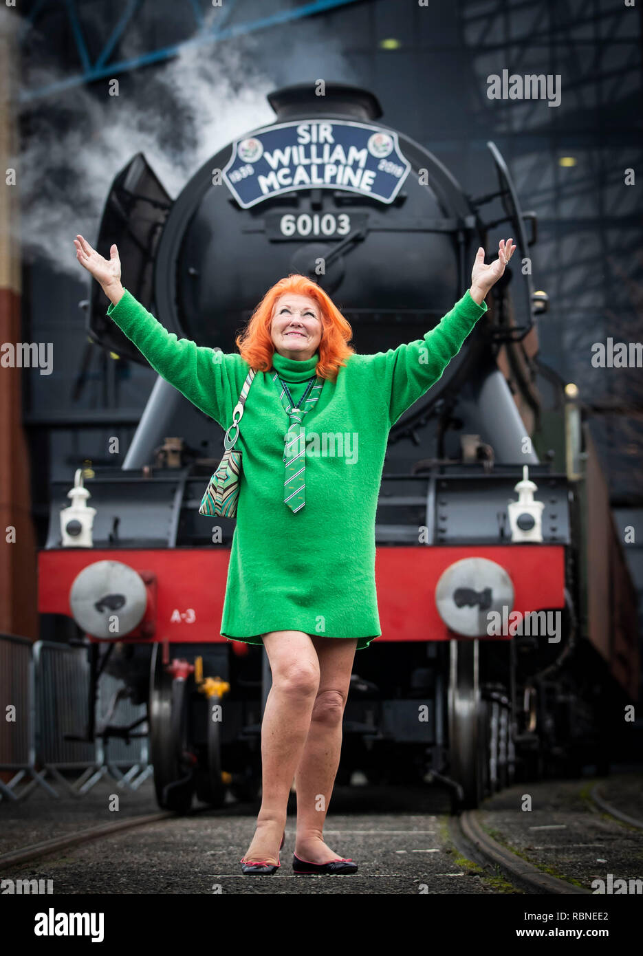Lady Judy McAlpine stands in front of the Flying Scotsman, that has ...