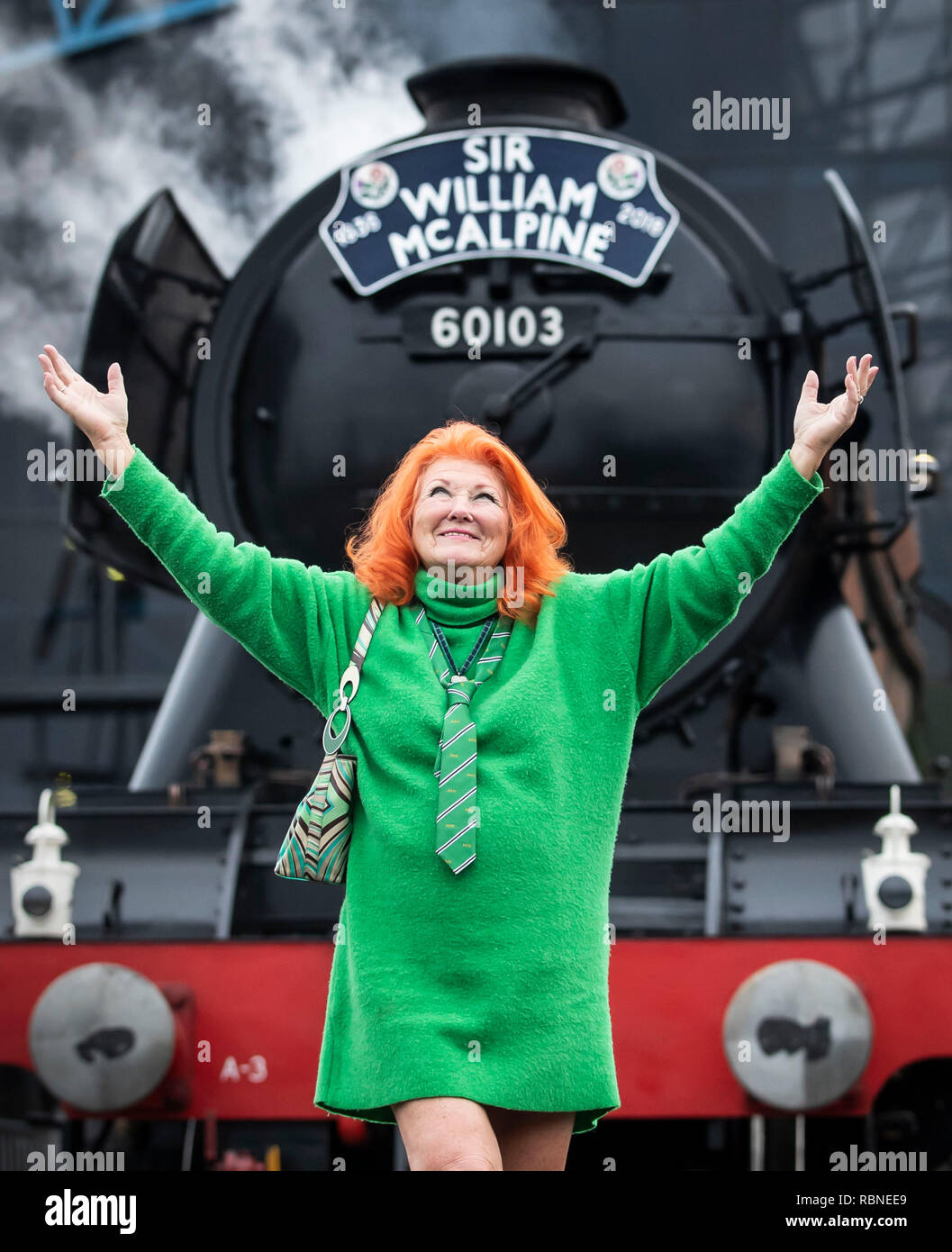 Lady Judy McAlpine stands in front of the Flying Scotsman, that has ...