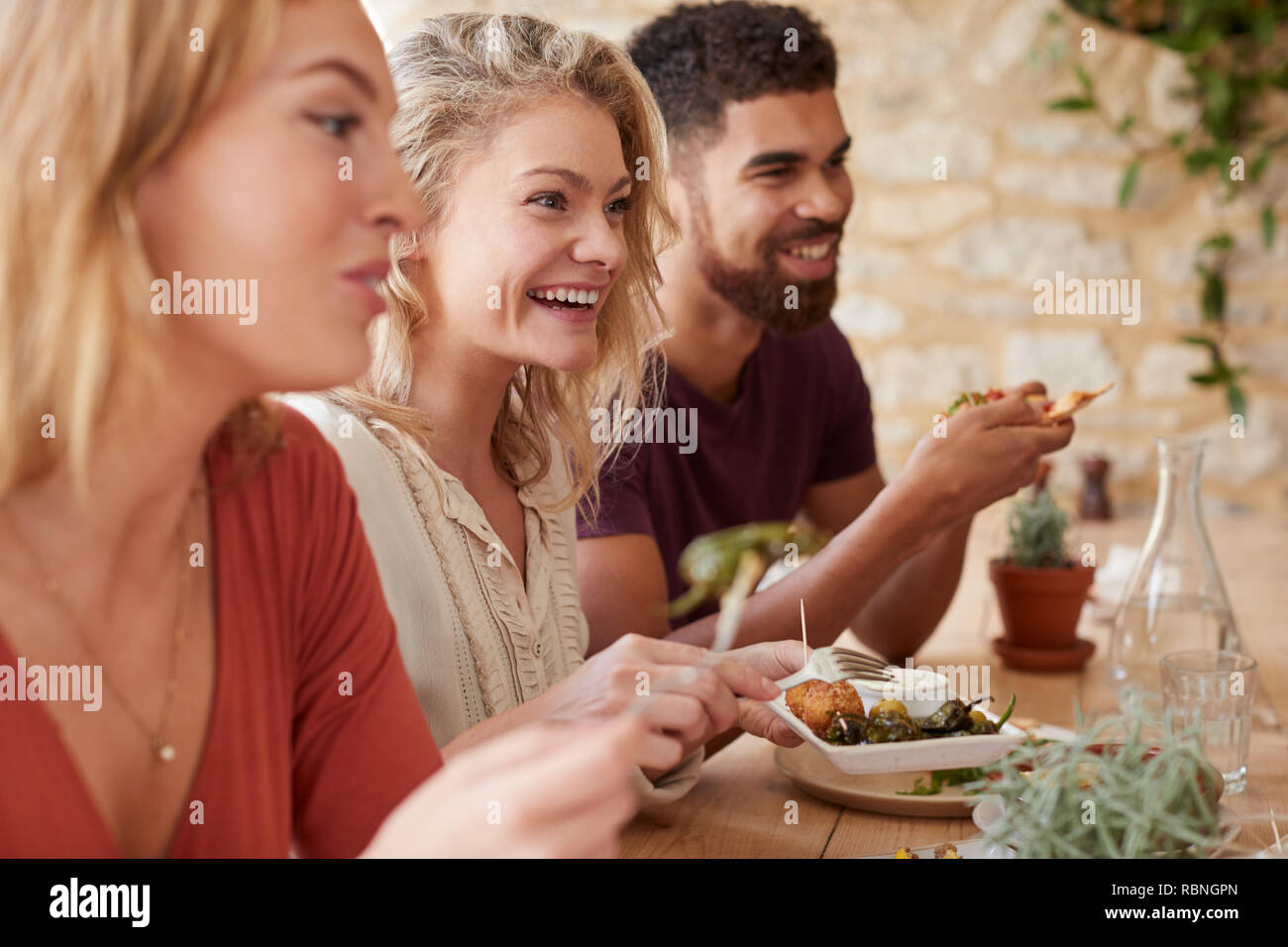 Three in a row dining table hi-res stock photography and images - Alamy