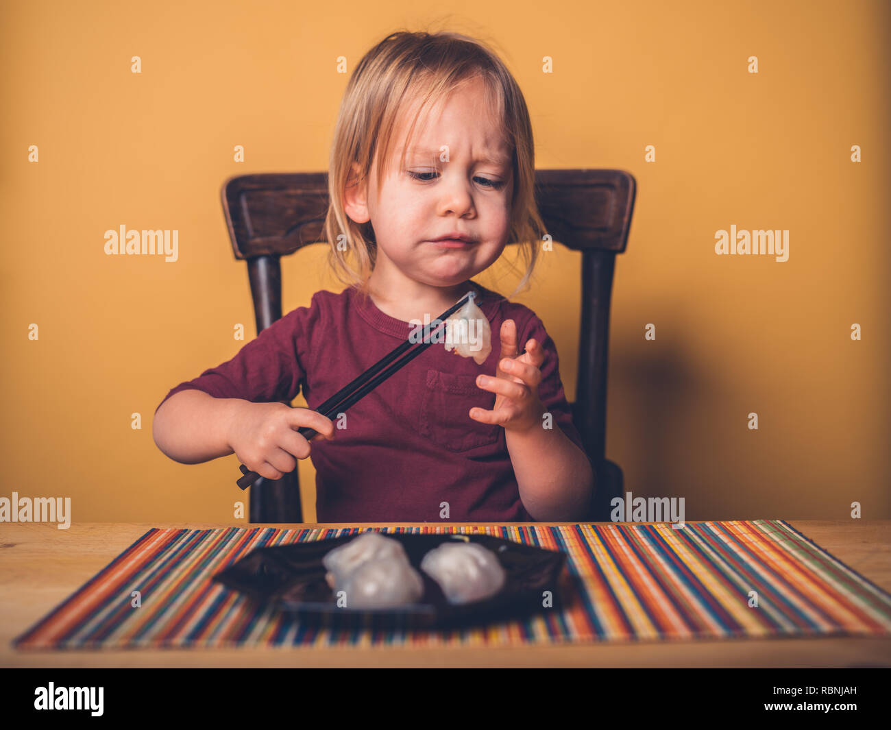 Chop sticks and toddler hi-res stock photography and images - Alamy