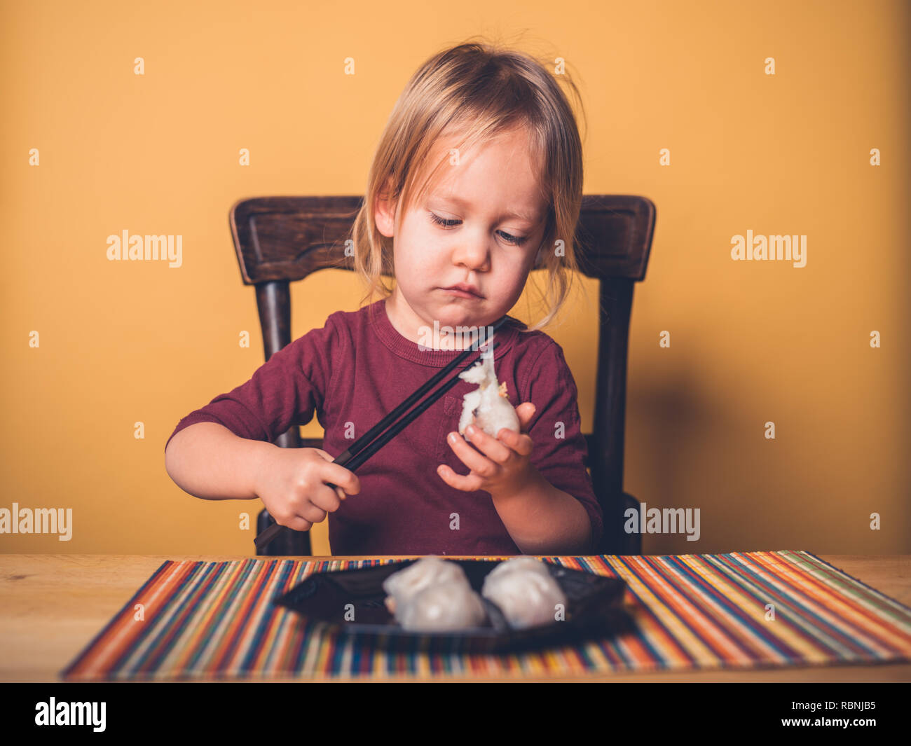 Chop sticks and toddler hi-res stock photography and images - Alamy