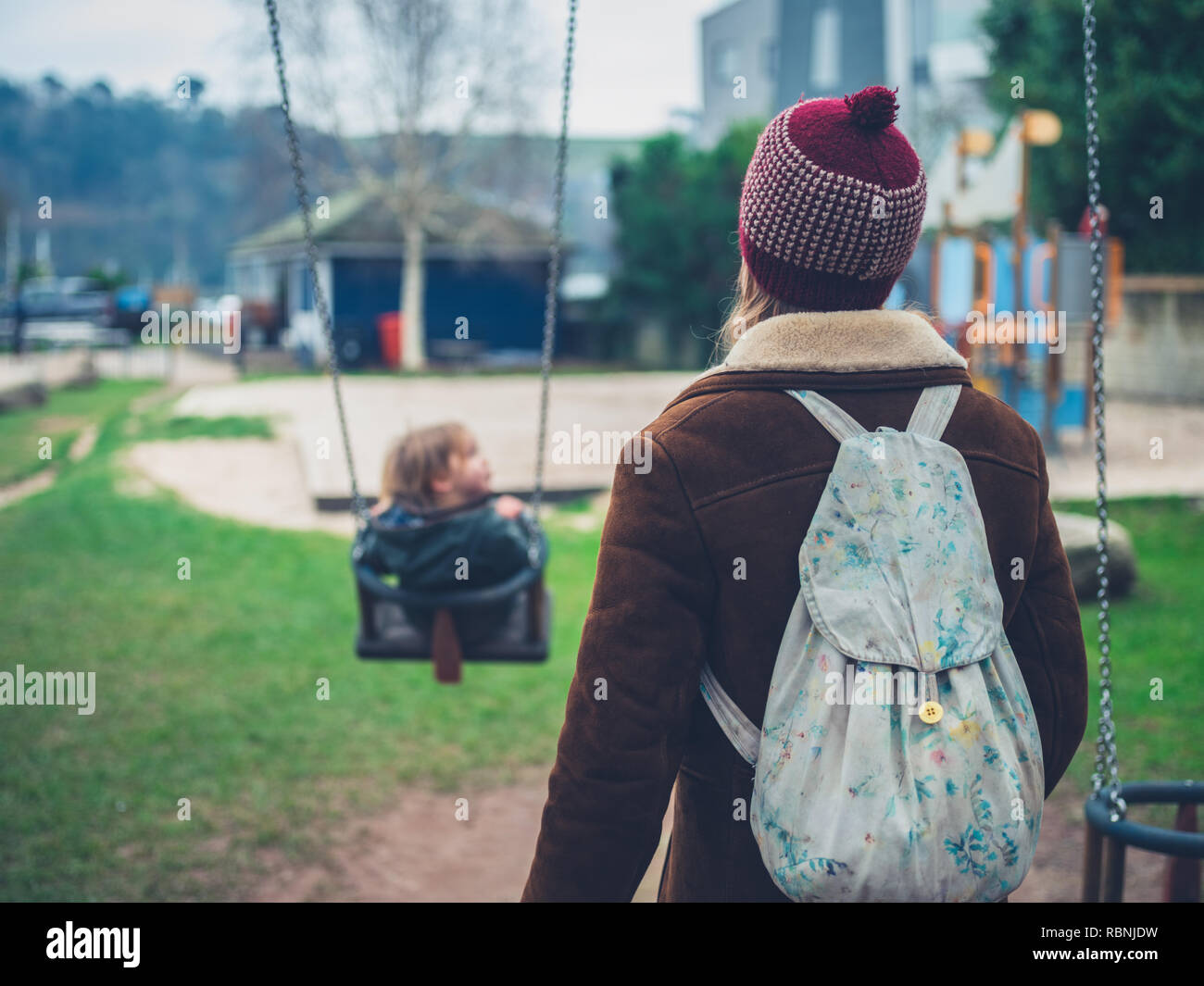 Child swing push hi-res stock photography and images - Alamy