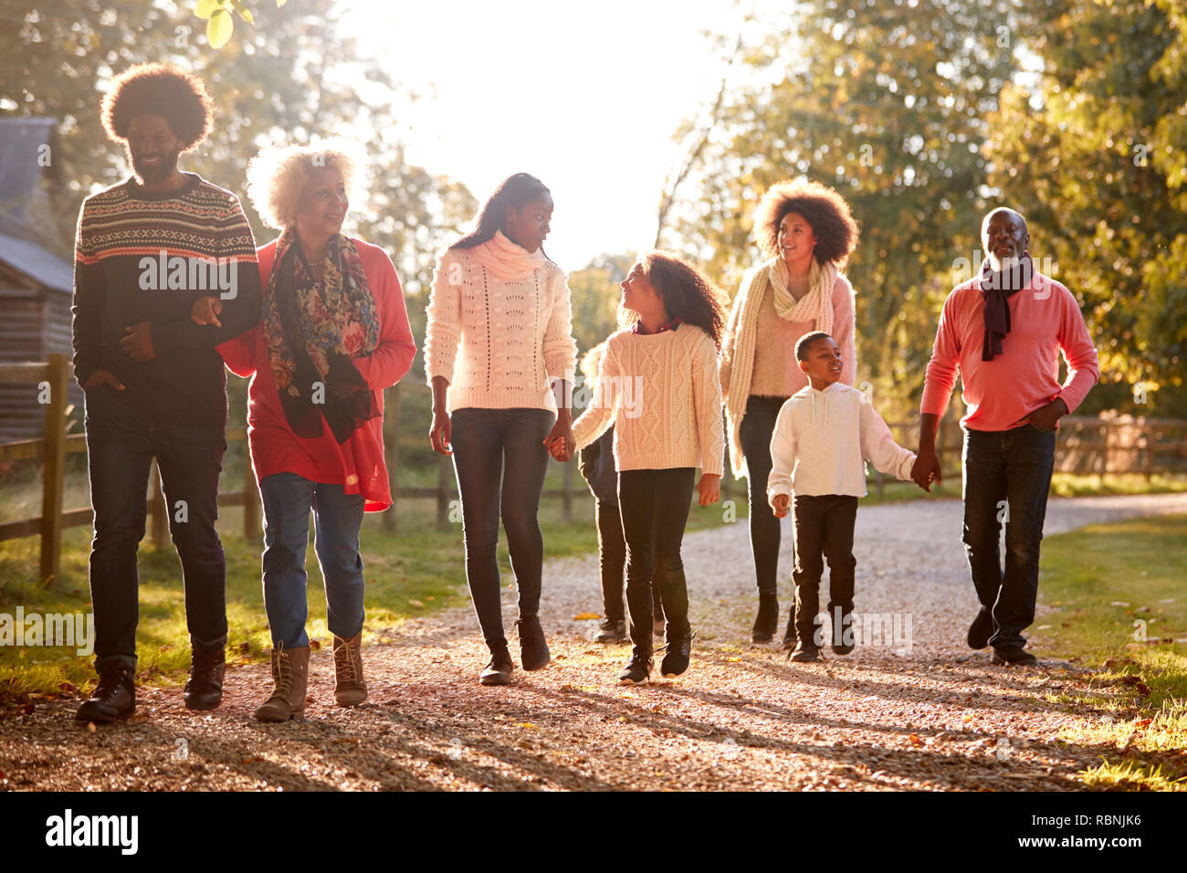 Multi Generation Family On Autumn Walk In Countryside Together Stock ...