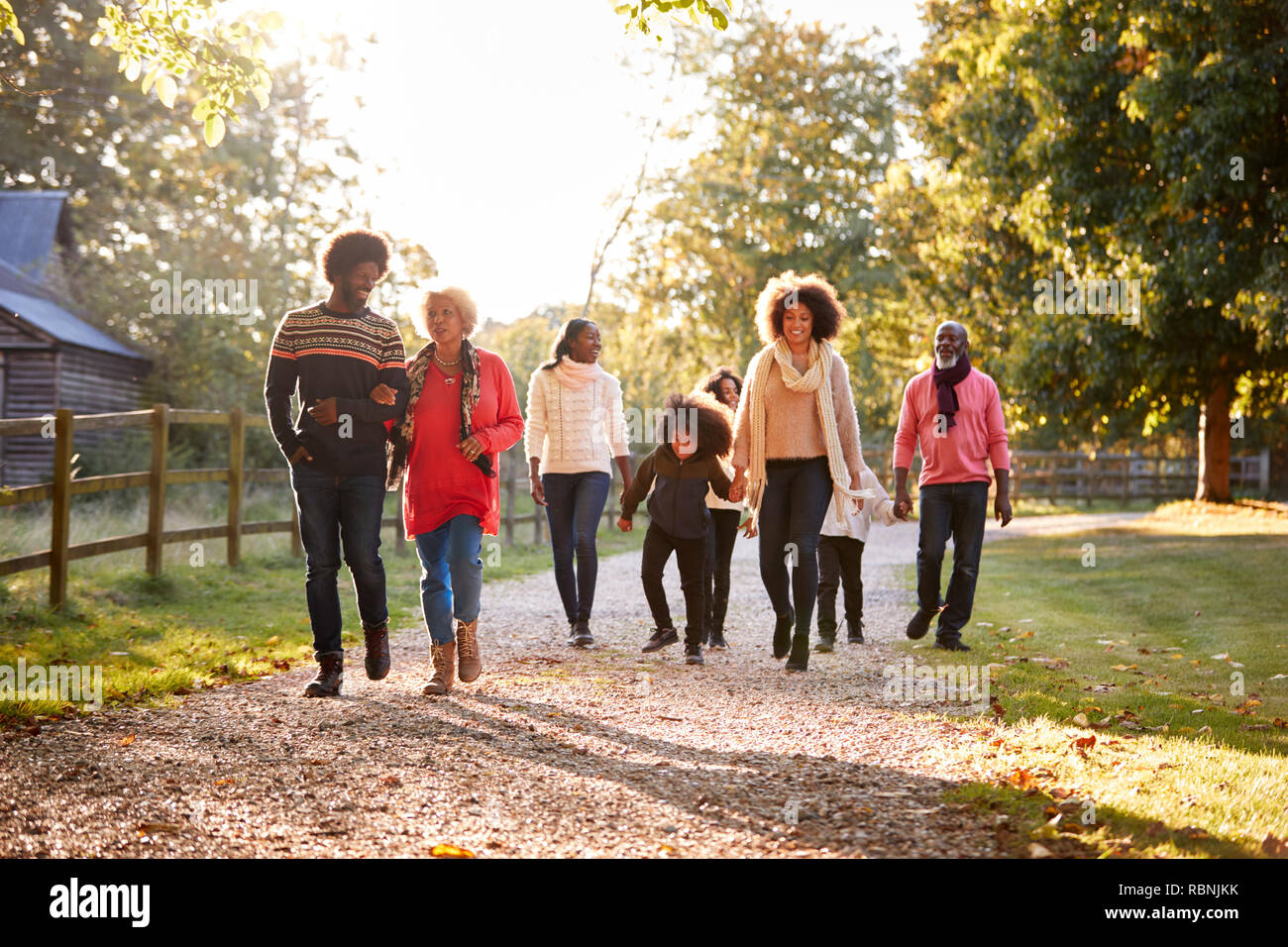 Multi Generation Family On Autumn Walk In Countryside Together Stock ...