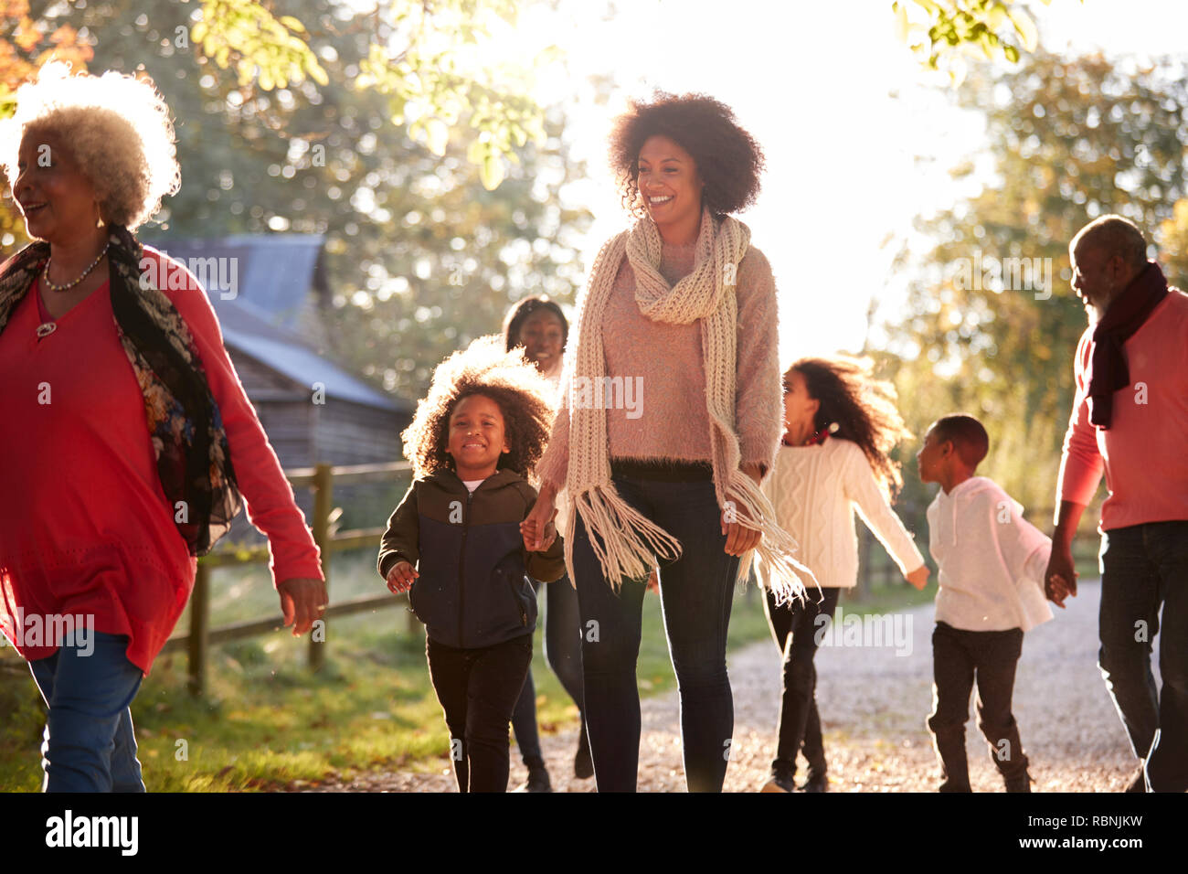 Multi Generation Family On Autumn Walk In Countryside Together Stock ...