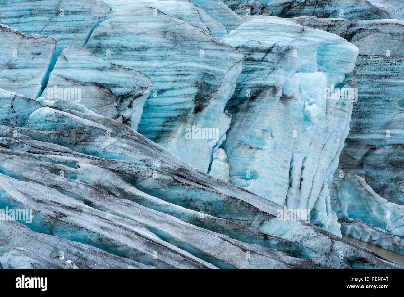 background of blue glacier ice formation with crevasses Stock Photo - Alamy