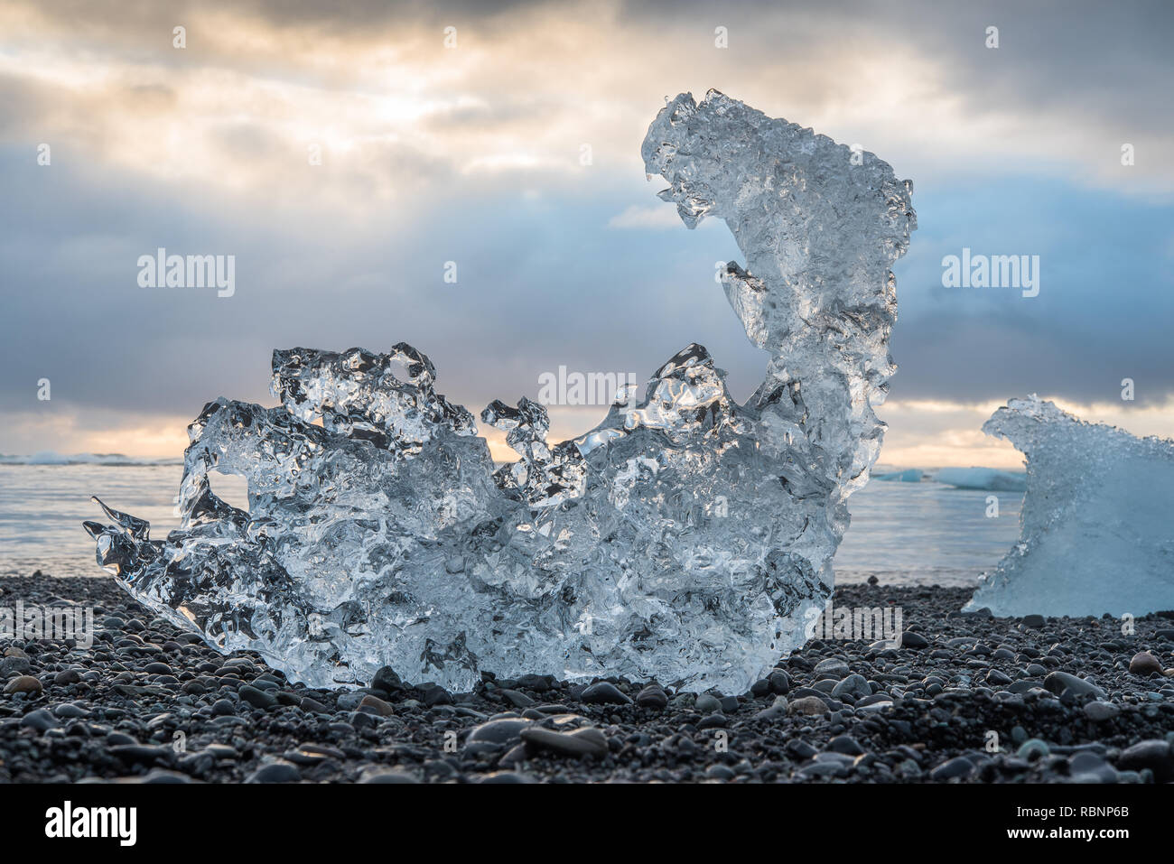 ice formation on the beach with ocean in background Stock Photo - Alamy