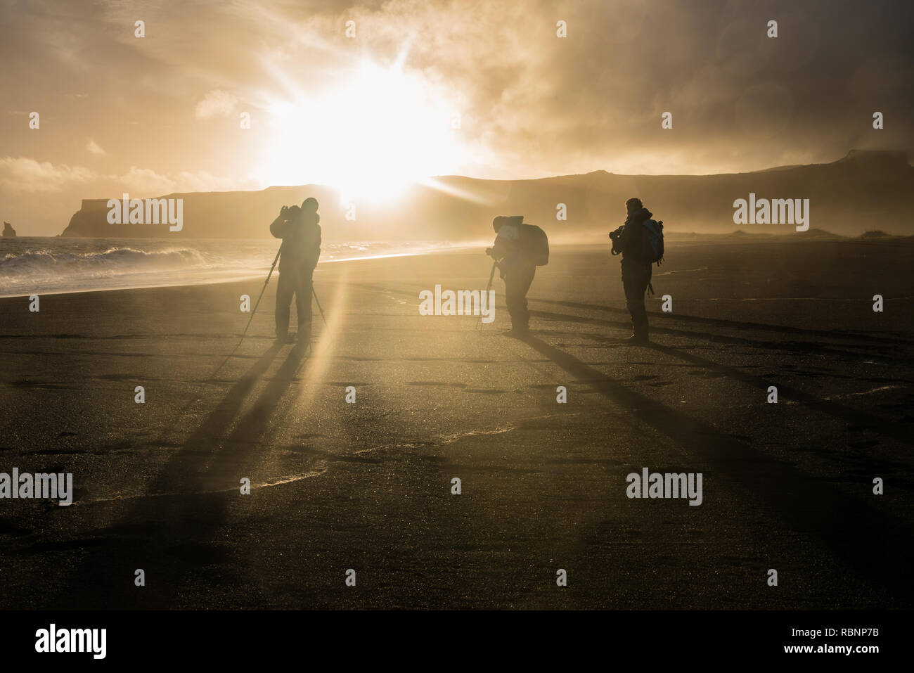 Three persons hi-res stock photography and images - Alamy