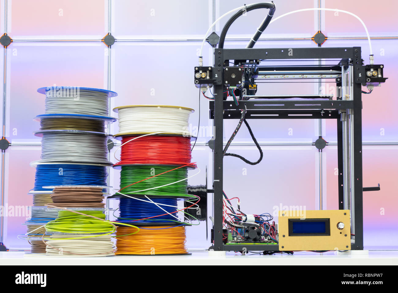 3D Printer and spools of plastic filaments Stock Photo - Alamy