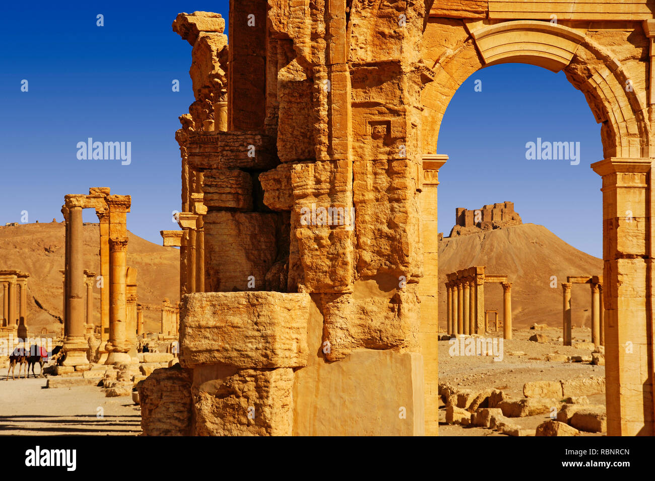 Monumental Arch and Columns and the Arab Castle. Ruins of the old Greco ...