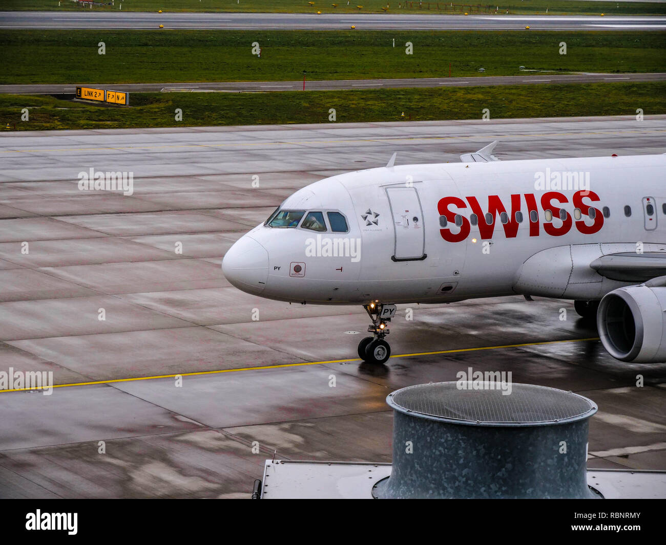 Swiss plane at Zürich airport, Switzerland Stock Photo - Alamy