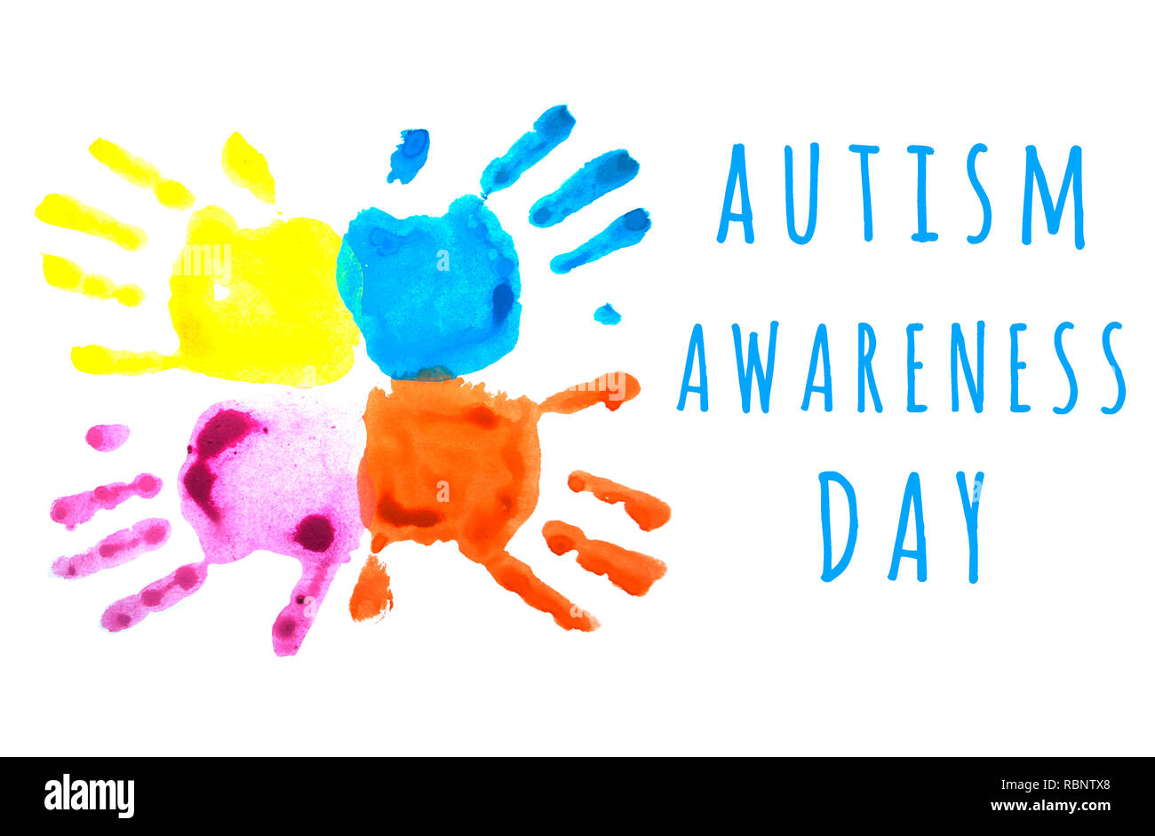 Four colorful child's handprints isolated on white. World autism ...