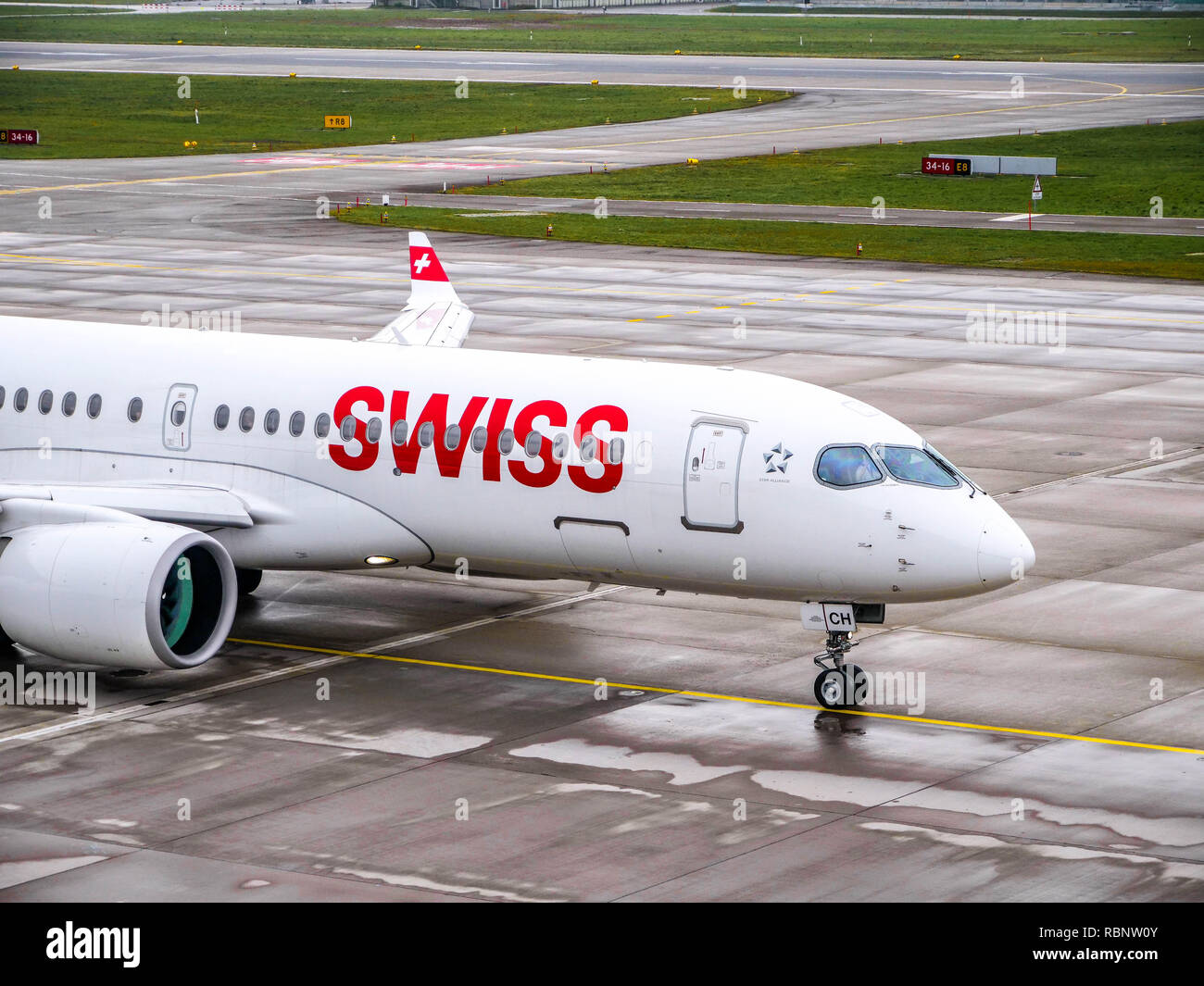 Swiss plane at Zürich airport, Switzerland Stock Photo - Alamy