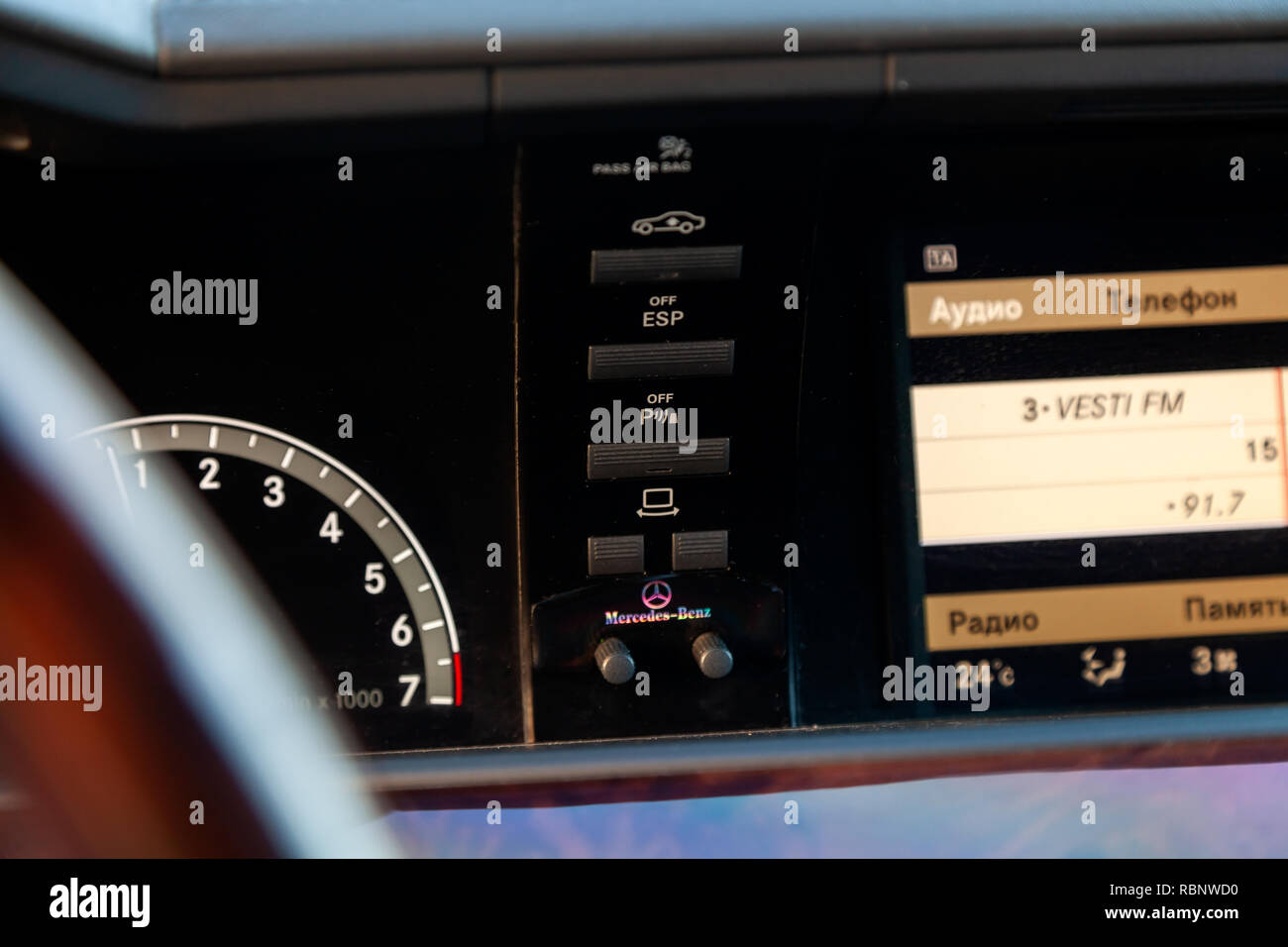 Multimedia system control buttons on the central panel in the interior ...