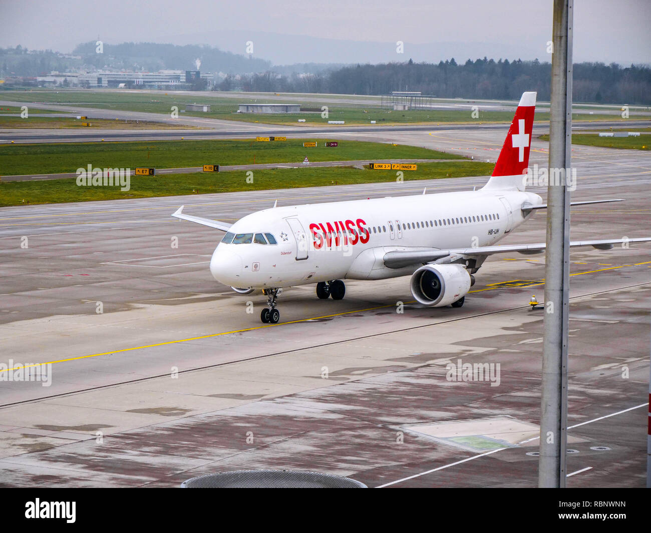 Swiss plane at Zürich airport, Switzerland Stock Photo - Alamy