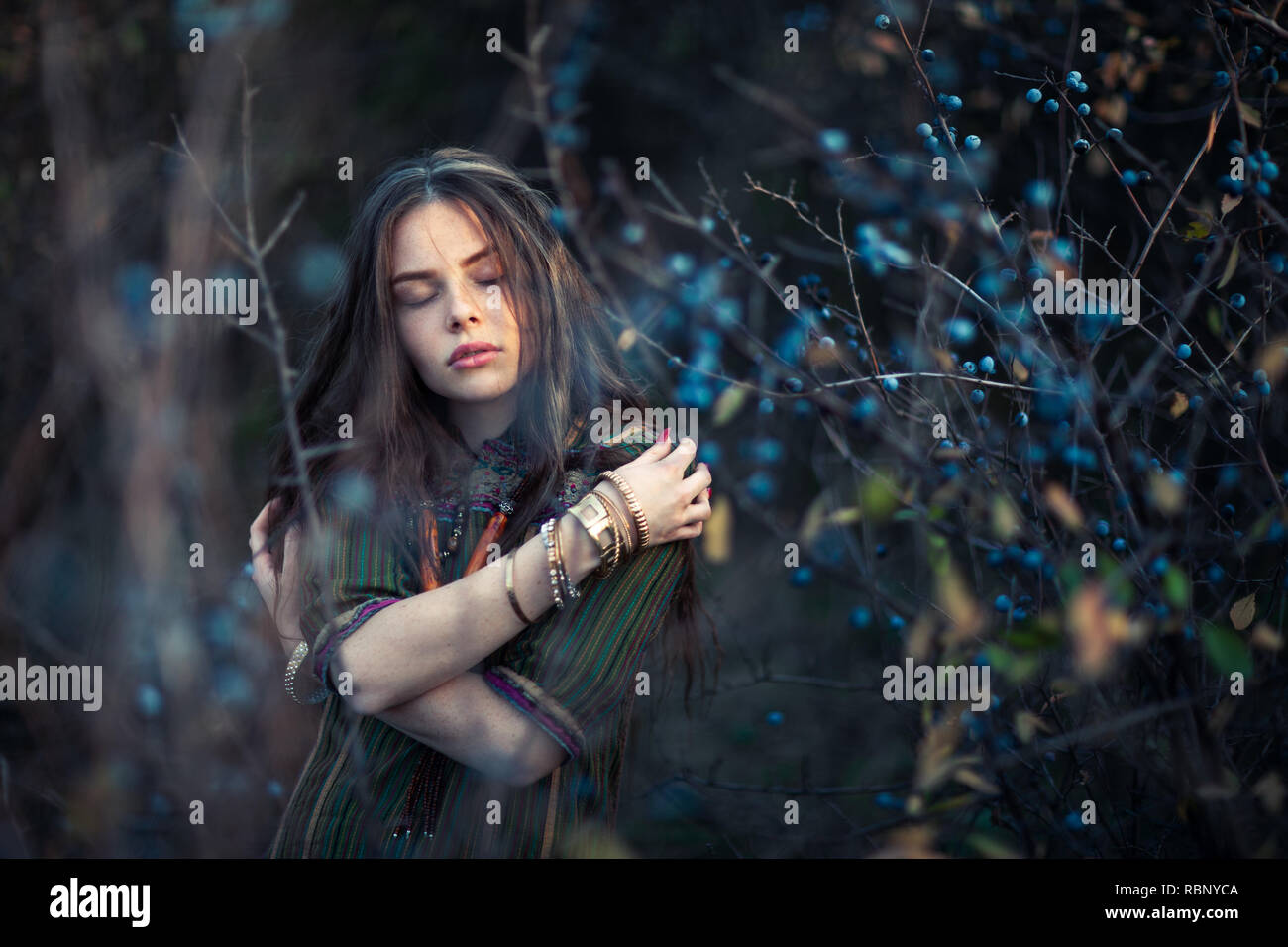 Sensual boho girl with eyes closed posing on nature background Stock ...