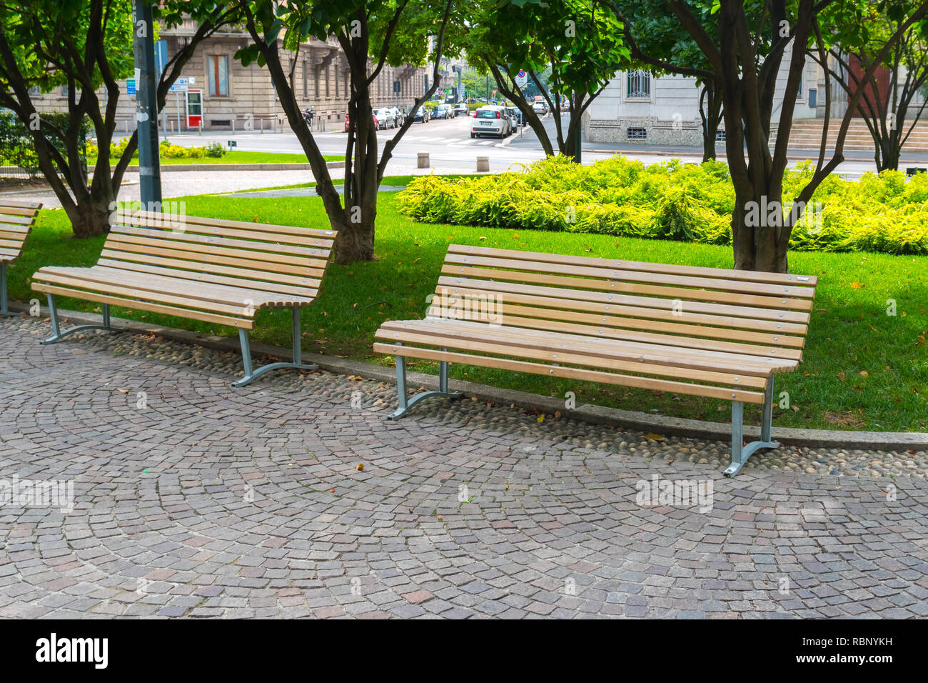 A Bench in Public Park in Milan, Italy Stock Photo - Alamy