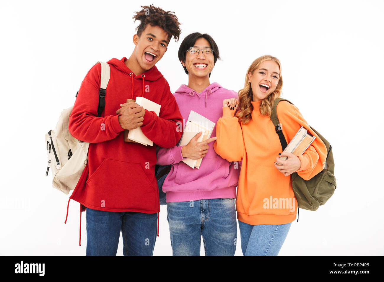 Image of a happy young group of friends students standing isolated over ...