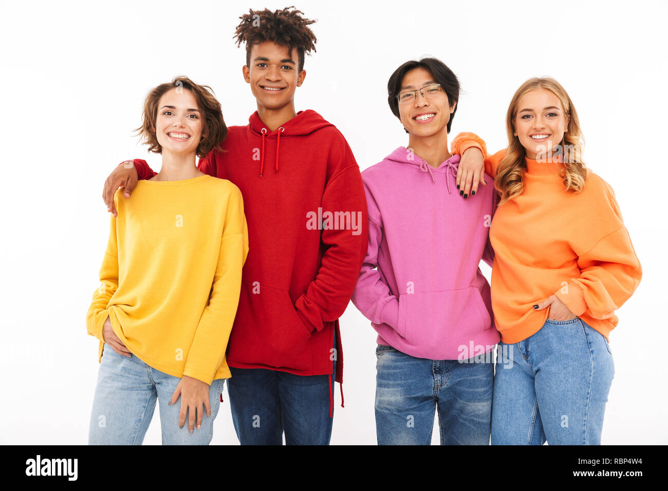 Group of cheerful multiracial friends standing isolated over white ...
