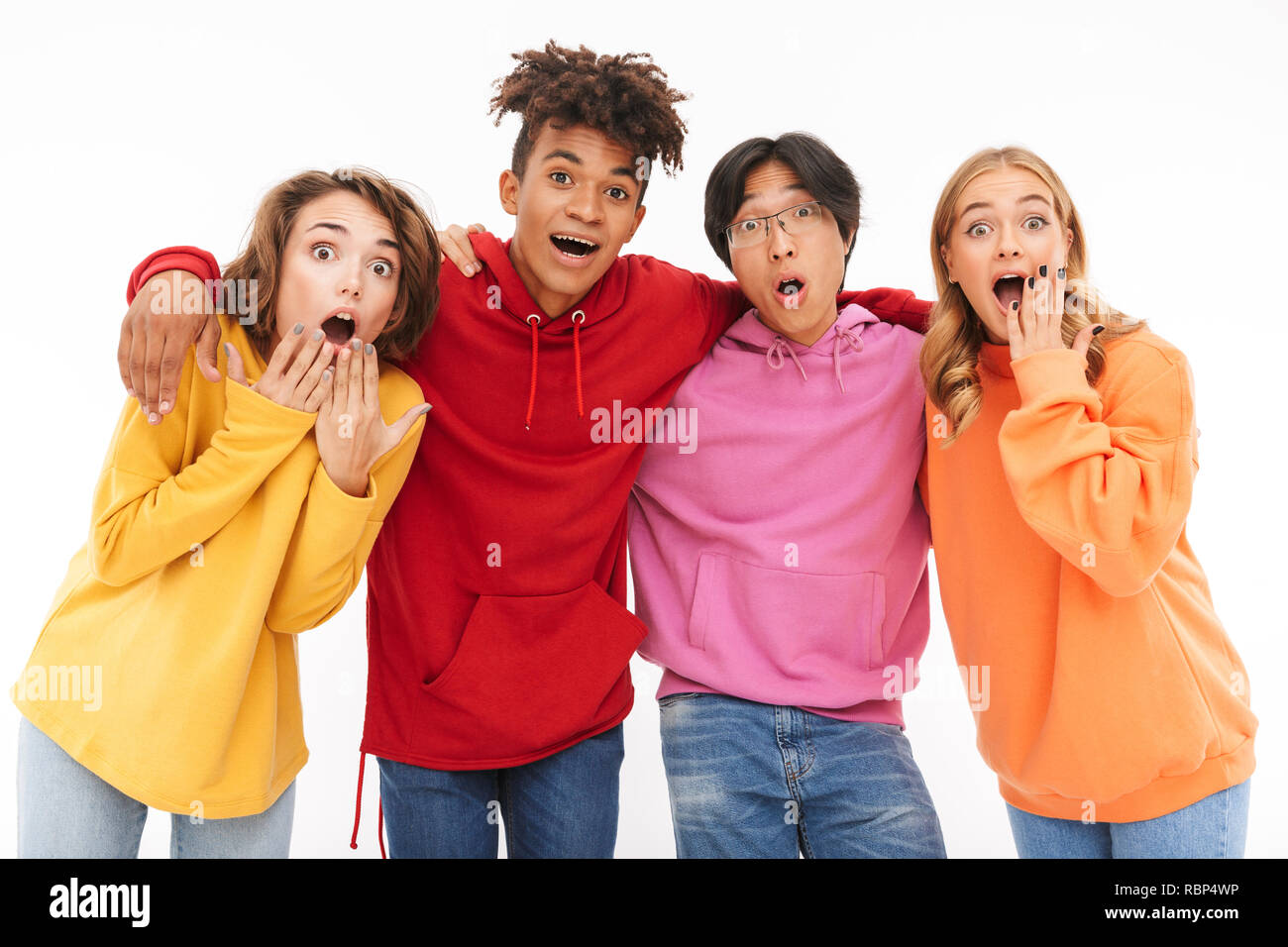 Group of cheerful teenagers isolated over white background Stock Photo ...
