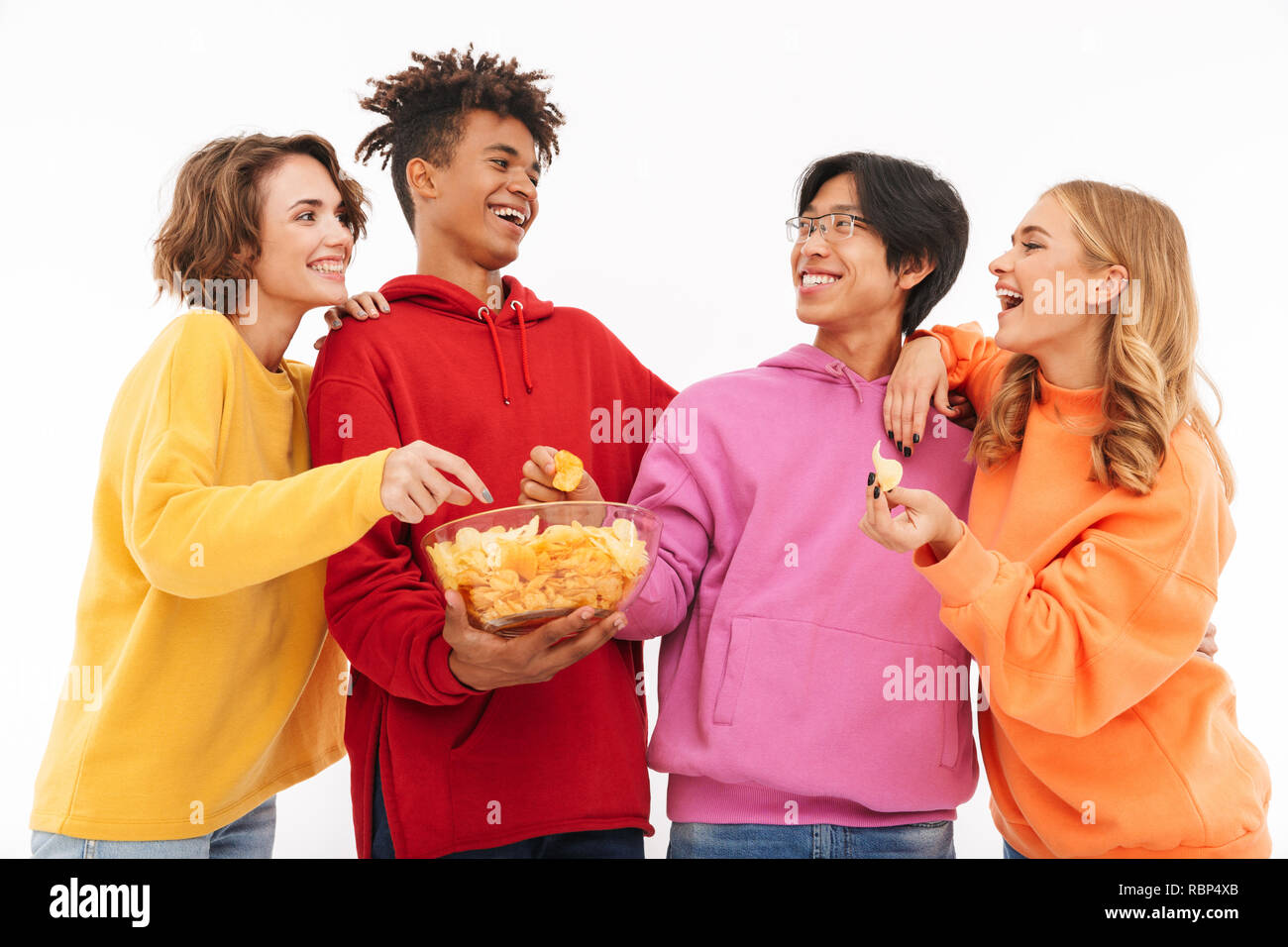 Image of young group of friends students standing isolated over white ...