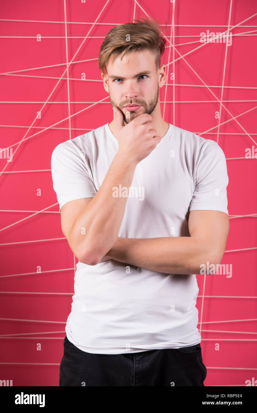 Man bearded thoughtful touch beard hand. Man stylish hair and healthy ...