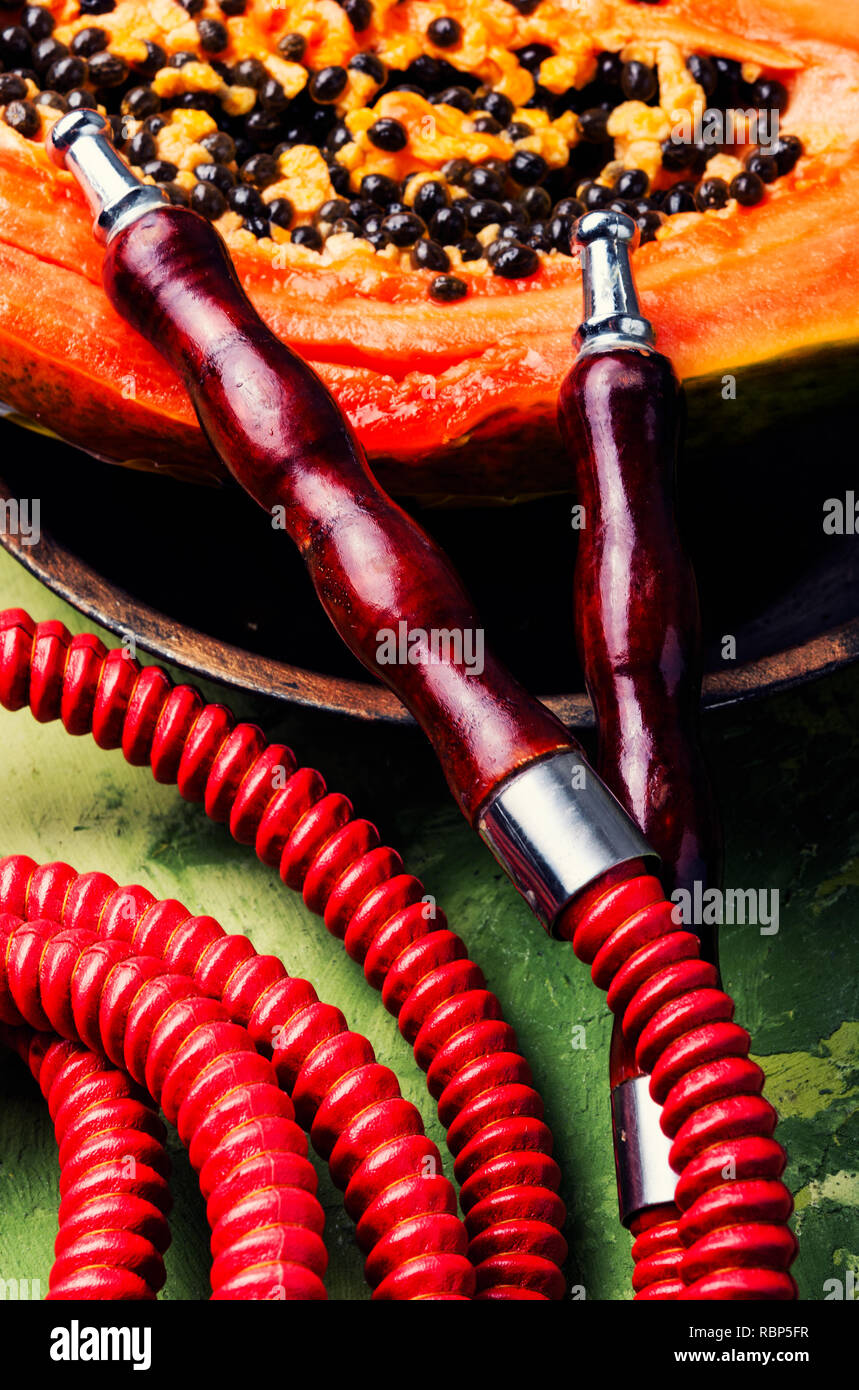 Fashionable fruit smoking hookah with a tobacco flavor of papaya ...