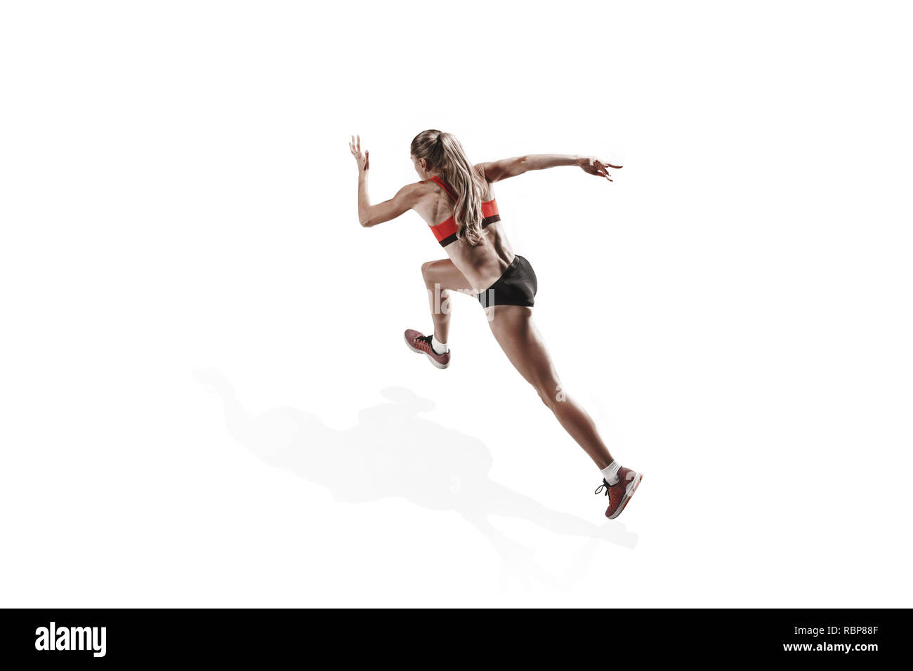 The one caucasian female silhouette of runner running and jumping on ...