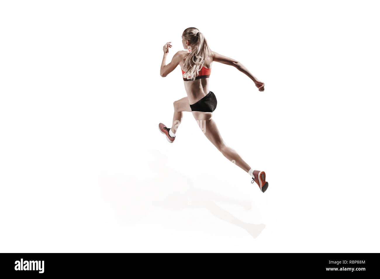 The one caucasian female silhouette of runner running and jumping on ...