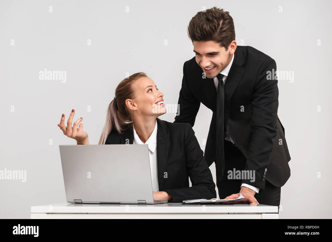 Professional couple suits hi-res stock photography and images - Alamy