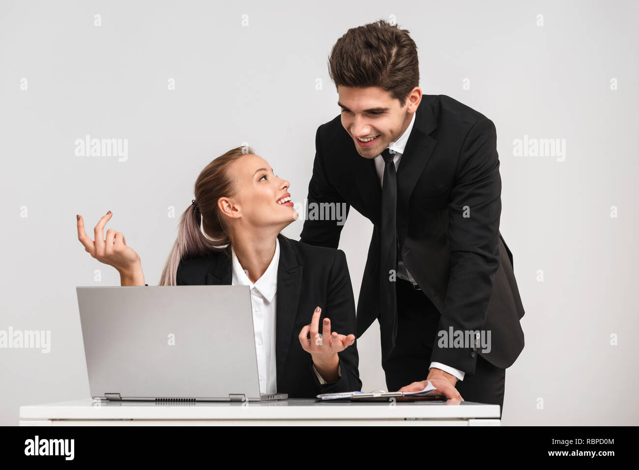 Professional couple suits hi-res stock photography and images - Alamy