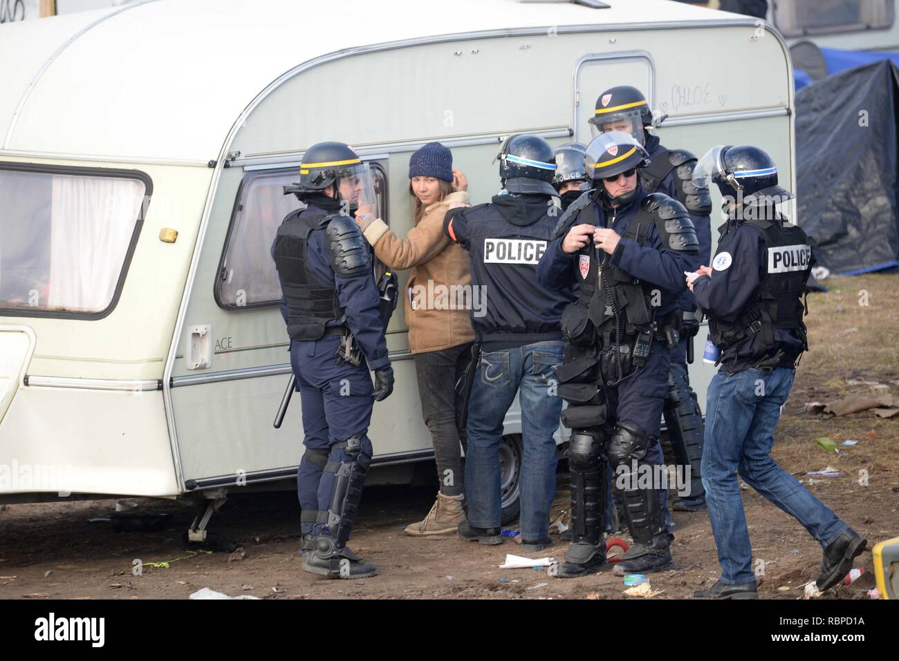 Workers begin to clear the southern section of the Calais Jungle in ...