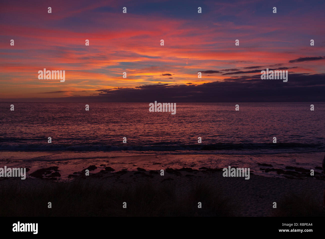Colorful sunset in early autumn on a Normandy beach in France Stock ...