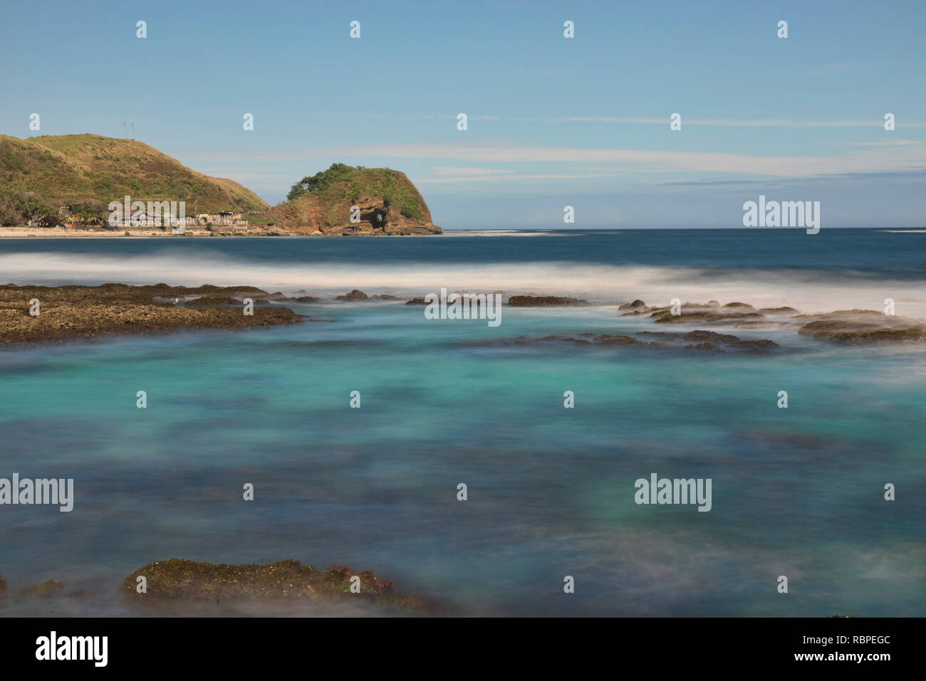 Bantay Abot Cave and turquoise sea, Pagudpud, Luzon, Philippines Stock ...