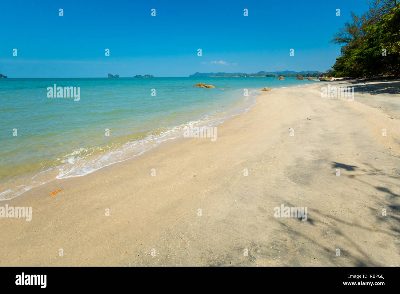 Sunny Teluk Yu beach on tropical Langkawi island in Malaysia. Beautiful ...
