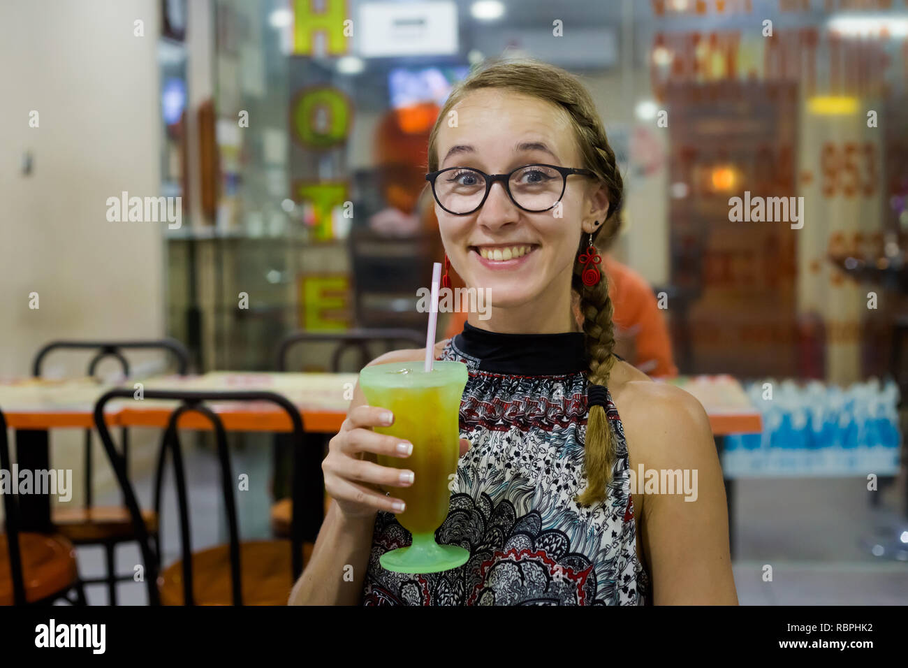 Girl drinking ice tea hi-res stock photography and images - Alamy